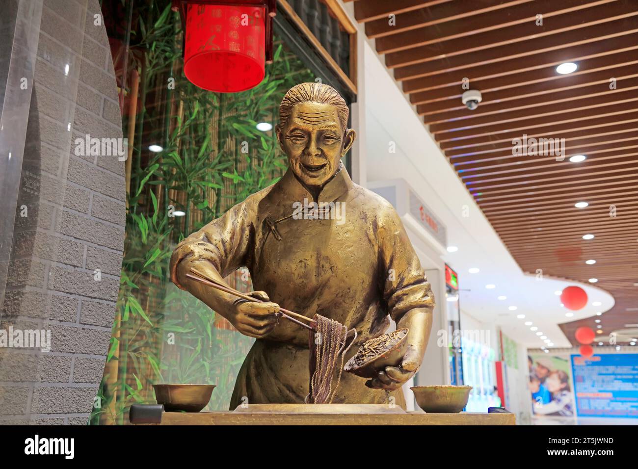 Tangshan City - March 10, 2018: bronze sculptures for old women in ...