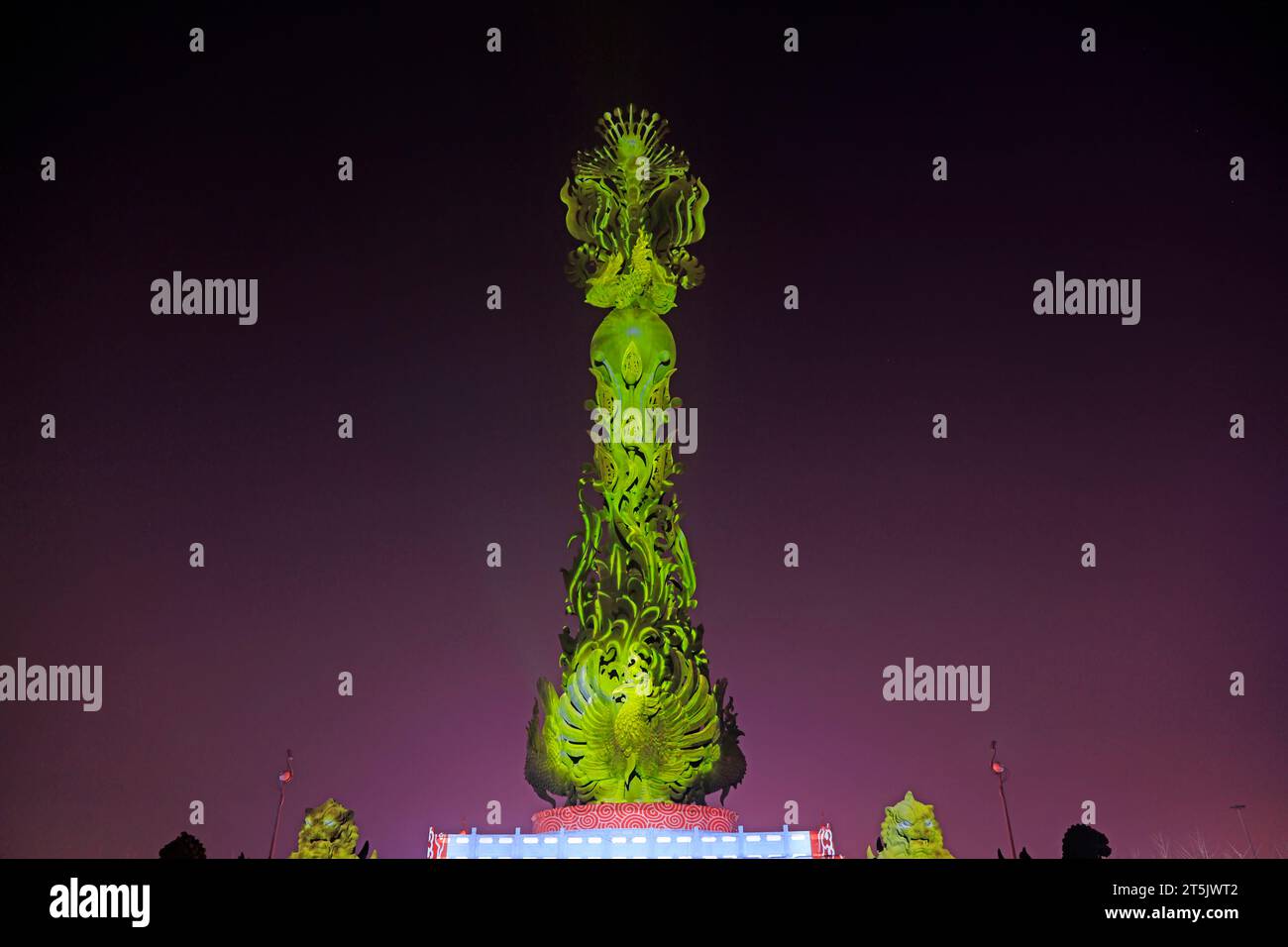 Phoenix sculpture in the night sky, Tangshan City, China Stock Photo ...