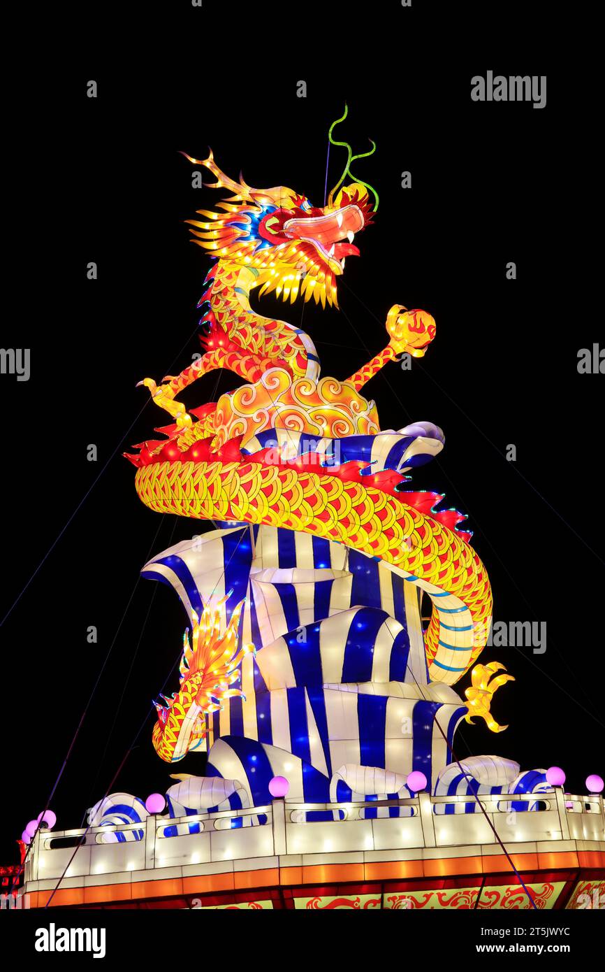 dragon shaped building in the night Stock Photo - Alamy