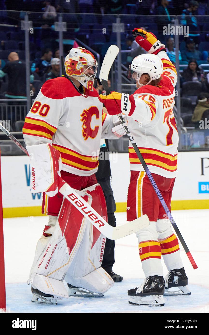 Calgary Flames forward Martin Pospisil (76) spreads his arms to hug ...