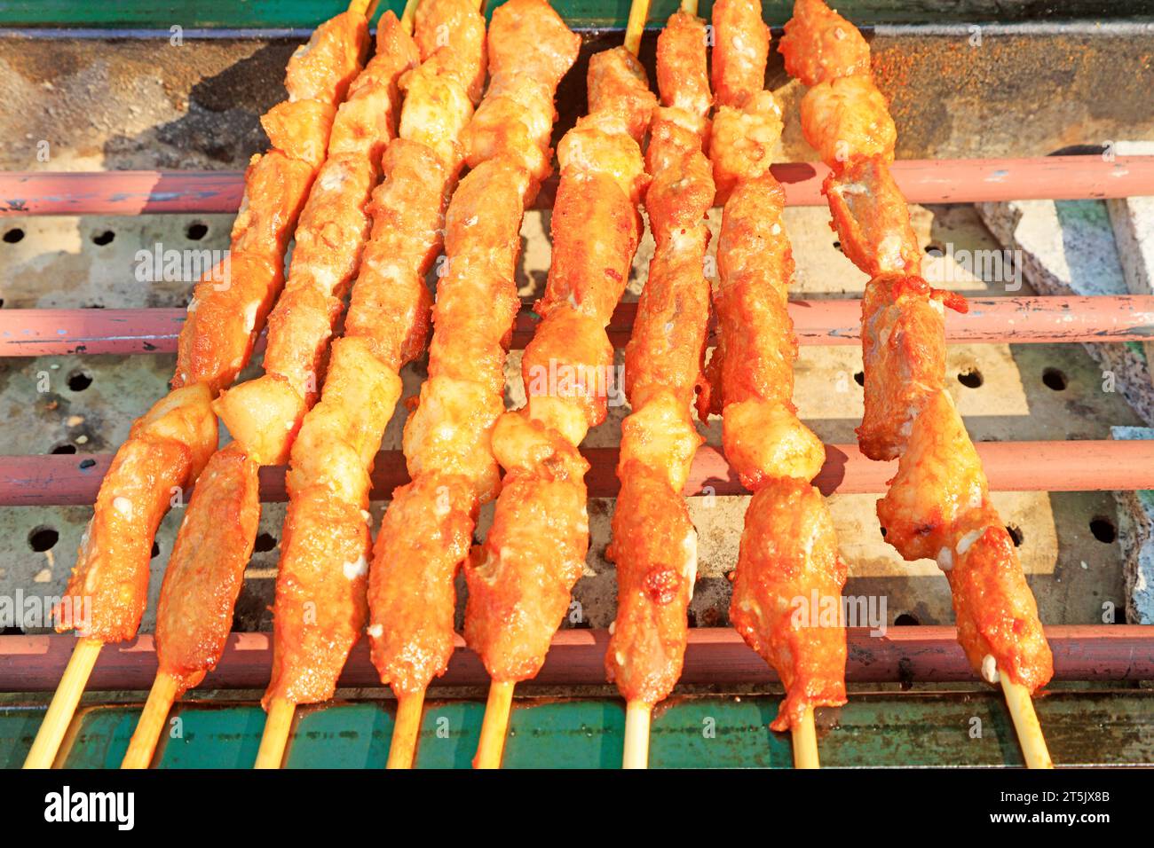 Chinese snacks meat string Stock Photo - Alamy