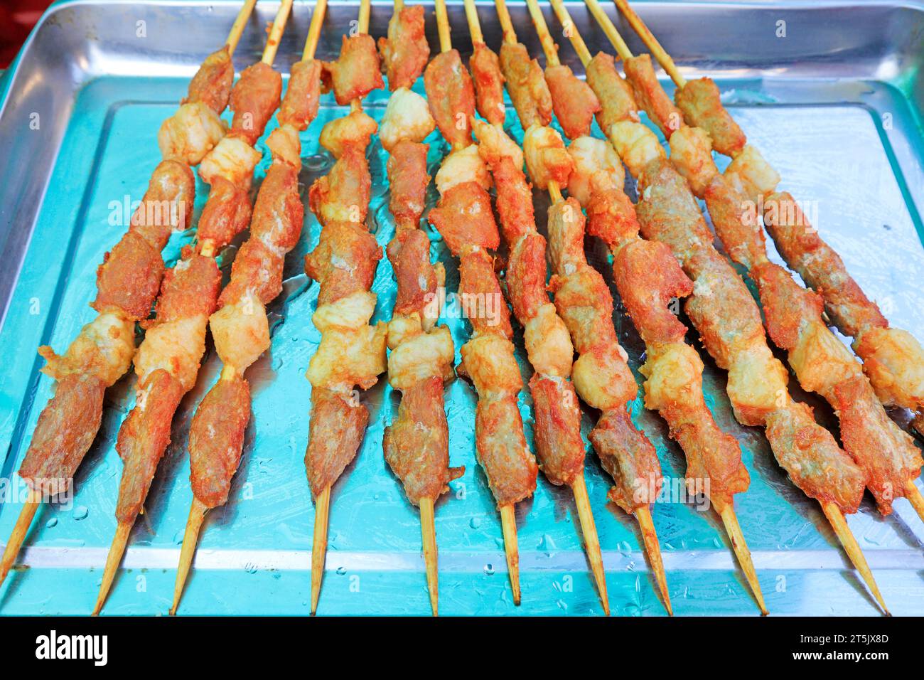 Chinese snacks meat string Stock Photo - Alamy