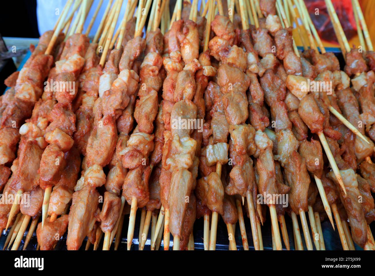 Chinese snacks meat string Stock Photo - Alamy