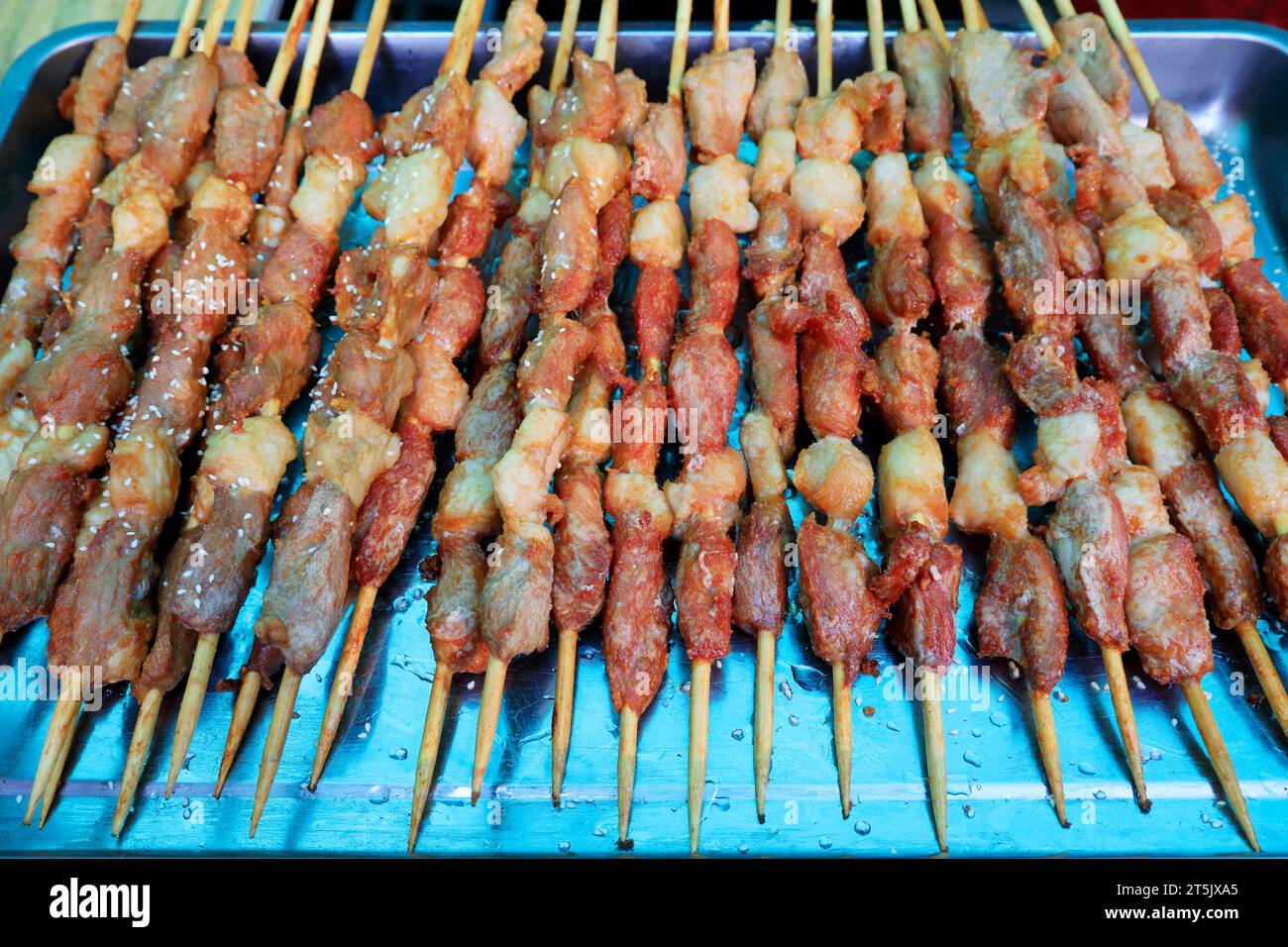 Chinese snacks meat string Stock Photo - Alamy