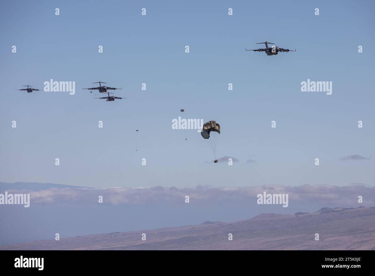 U.S. Air Force C-17 Globemaster IIIs conducts an airdrop during Joint ...