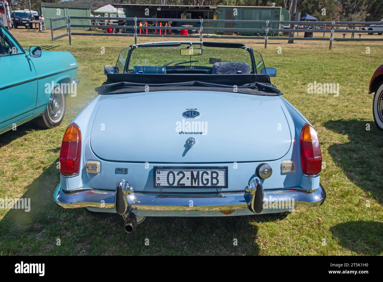 Rear voew o a pale blue 1970s MGB roadster Stock Photo - Alamy