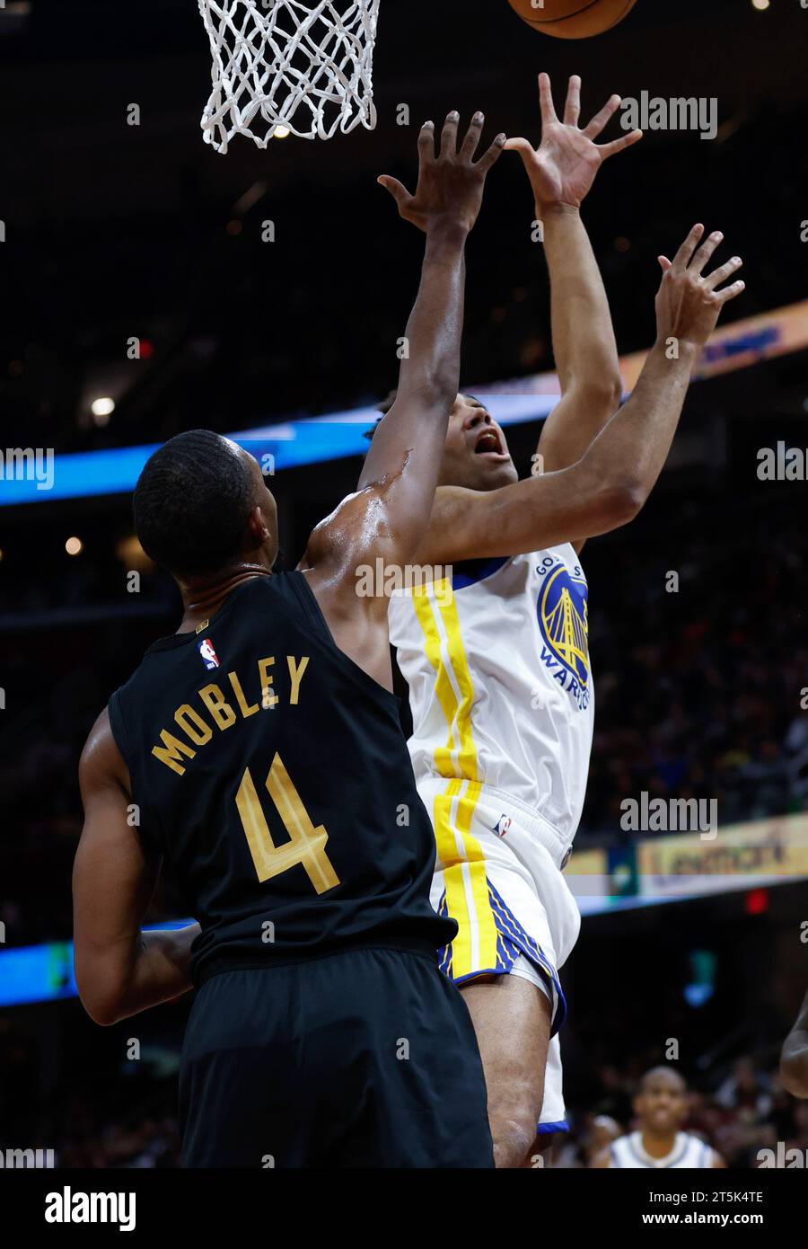 Golden State Warriors forward Trayce Jackson-Davis, right, shoots ...