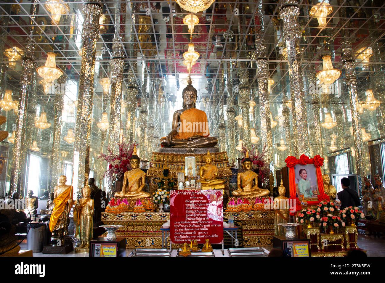 Buddha statue in antique glass ubosot hall for thai people travelers ...