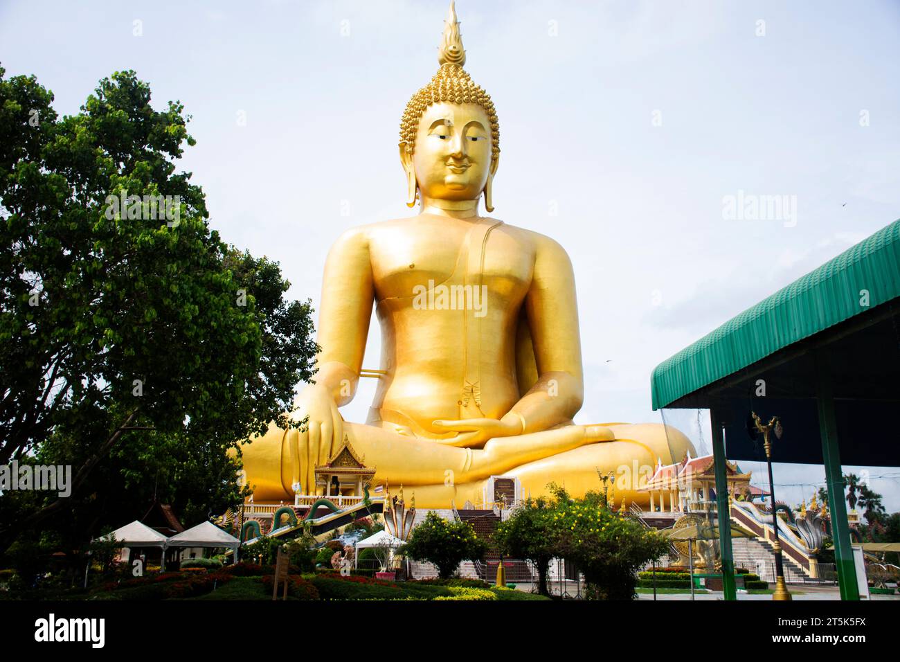 Ancient golden big buddha statue at outdoor for thai people travelers ...