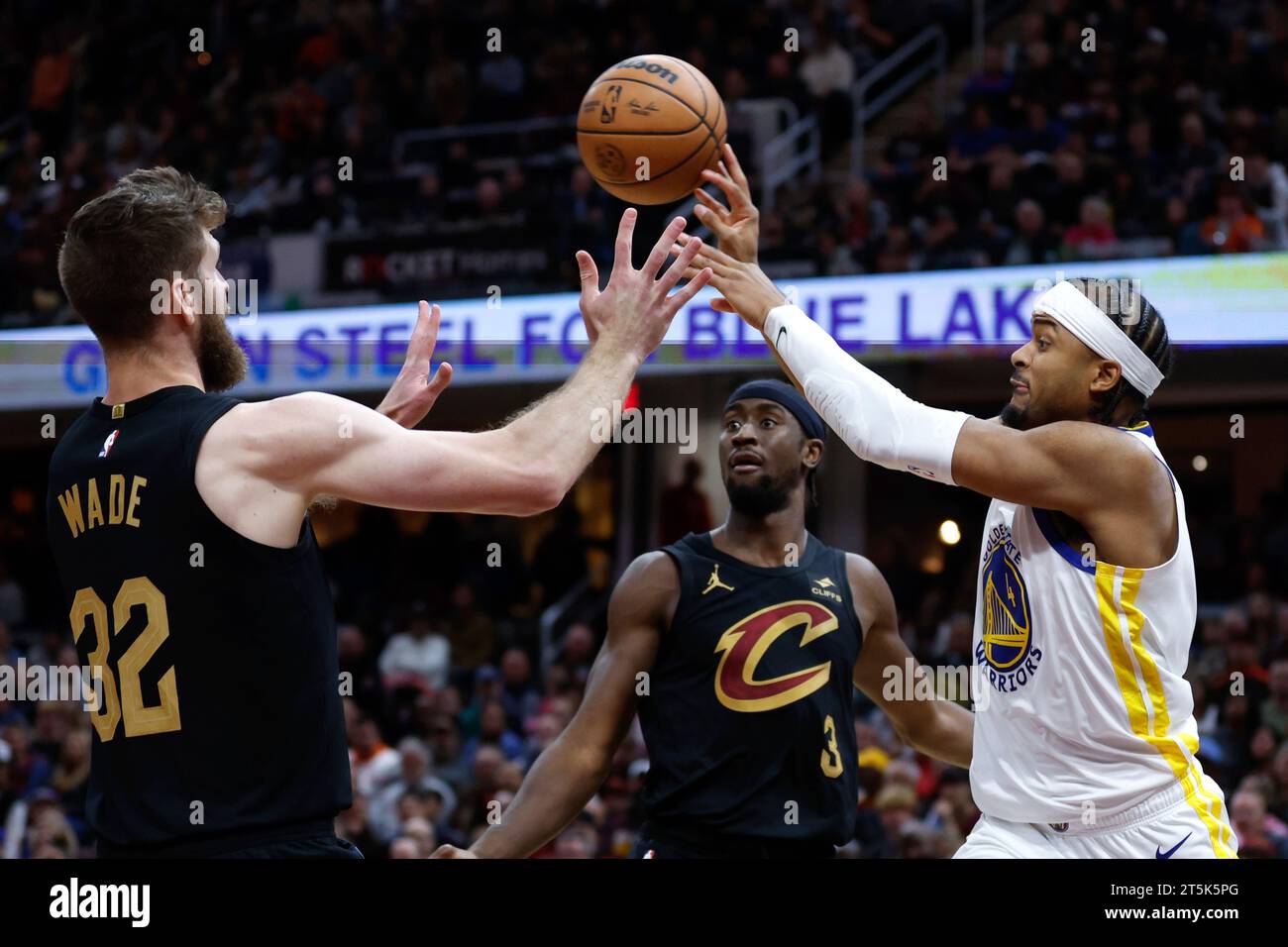 Golden State Warriors guard Moses Moody, right, passes against ...