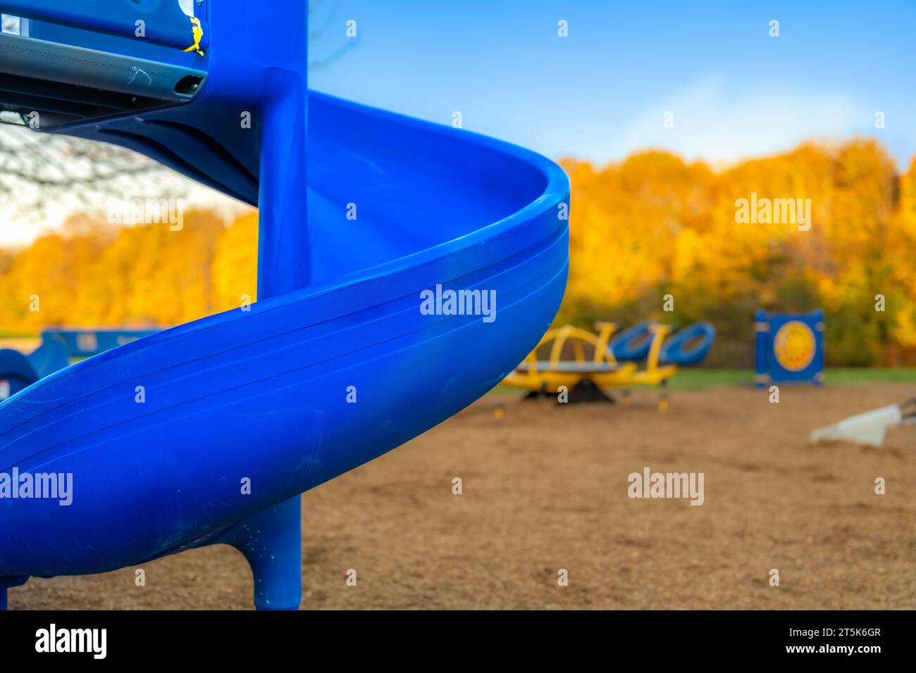 Unidentified typical elementary school playground with engineered wood ...