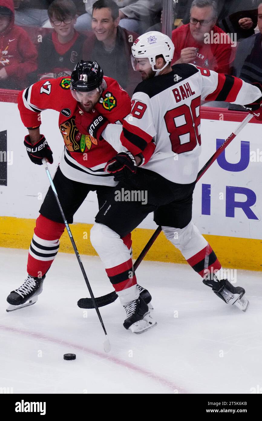 Chicago Blackhawks left wing Nick Foligno, left, and New Jersey Devils ...