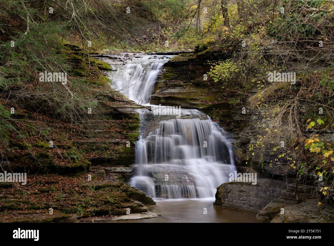 Afternoon fall, autumn photo of a waterfall in Robert H. Treman State ...
