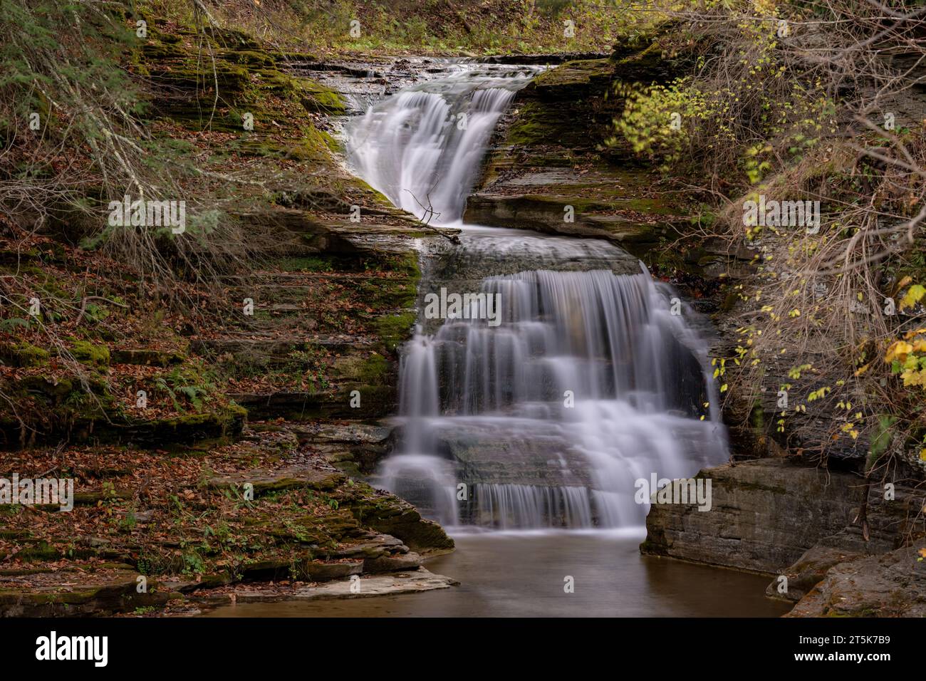 Afternoon fall, autumn photo of a waterfall in Robert H. Treman State ...