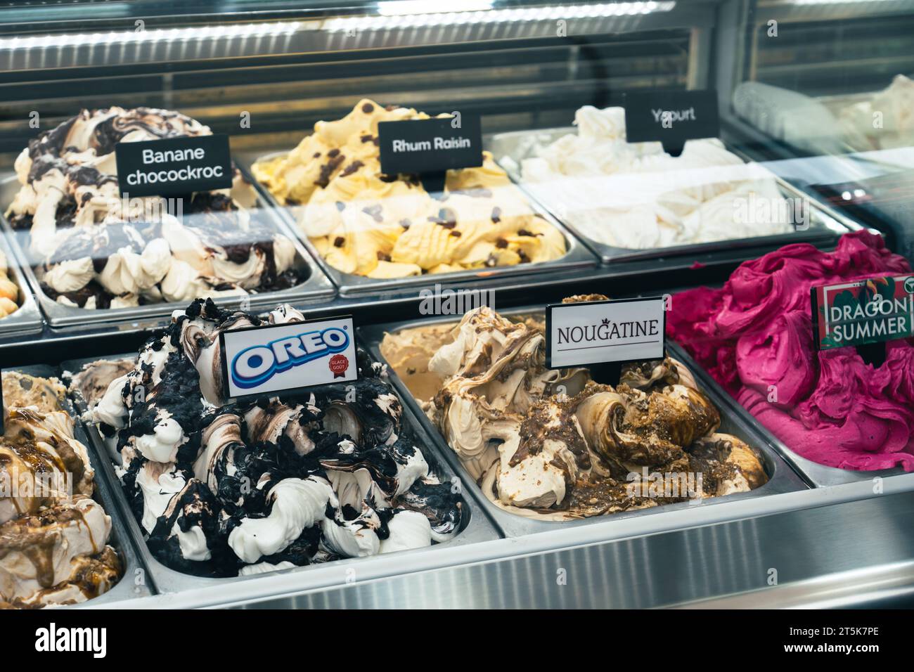 Showcase counter with soft Italian ice cream in France Stock Photo - Alamy