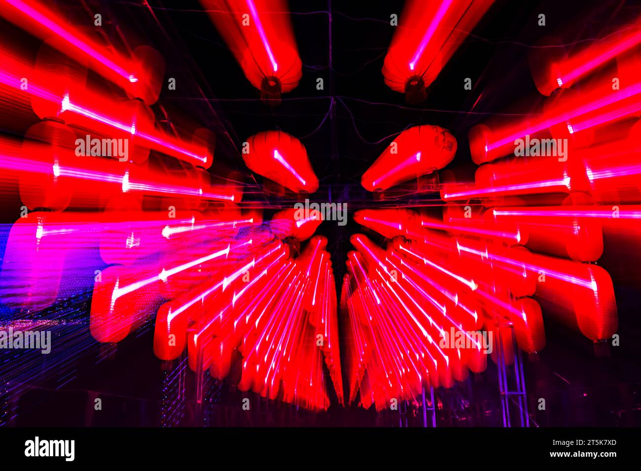 Red stretching effect in black background Stock Photo - Alamy