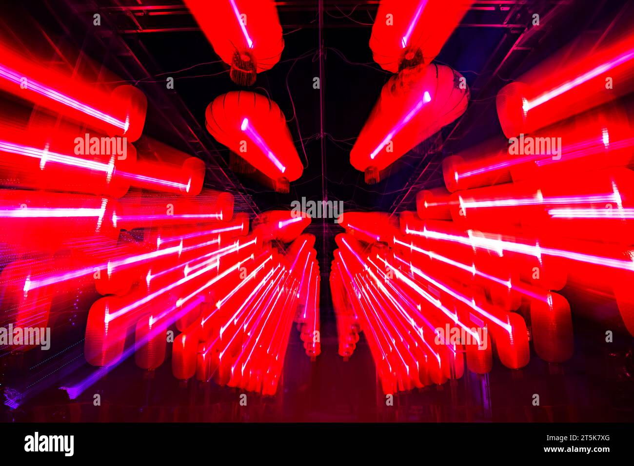 Red stretching effect in black background Stock Photo - Alamy