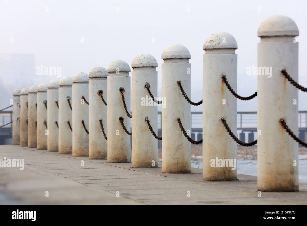 Pillars and chains Stock Photo - Alamy