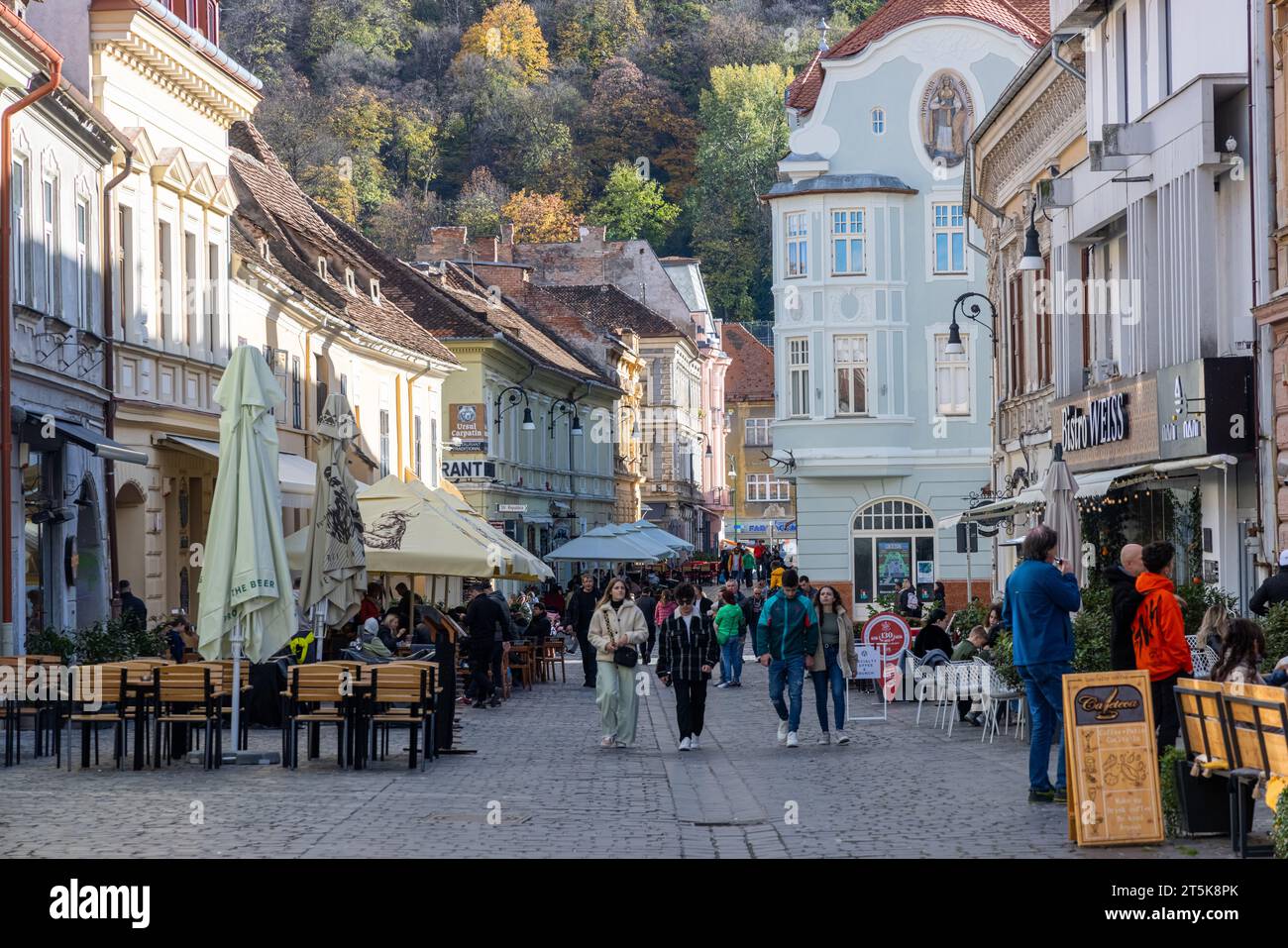 Brasov, Romania - 5 Nov 2023 - Visitors walking amidst restaurants on ...