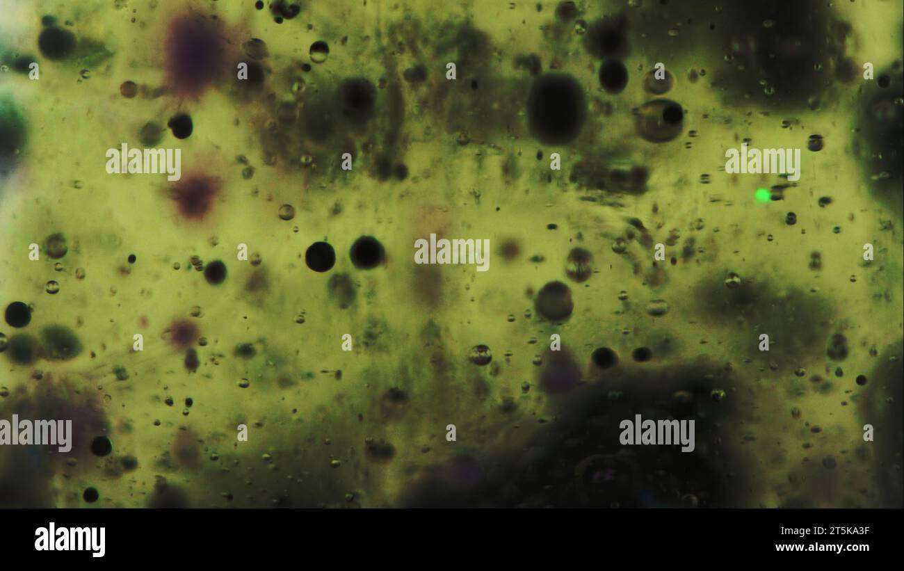 Bubble fluid oil texture ink water drop green gel Stock Photo - Alamy