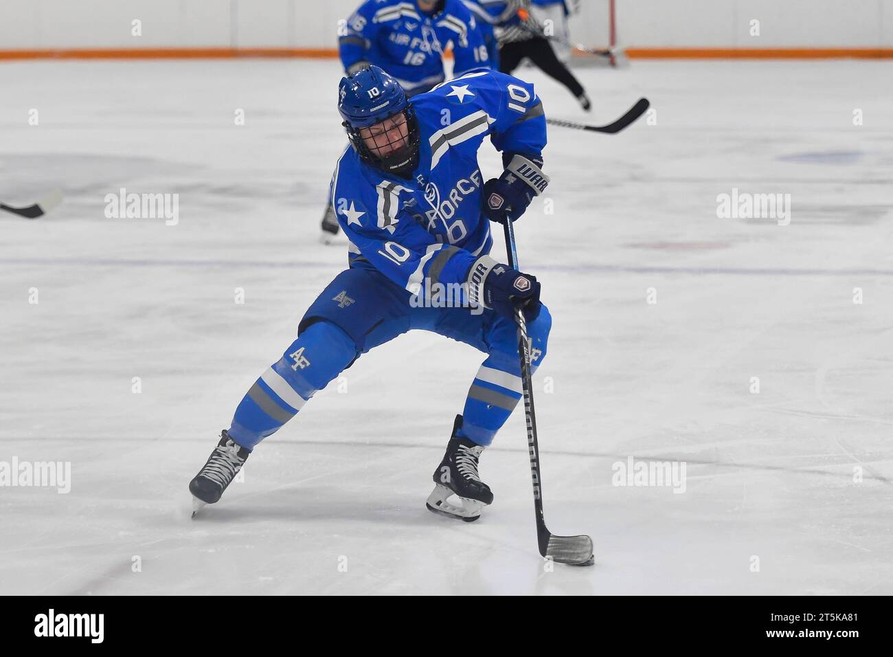 Air Force right wing Austin Schwartz (10) skates with the puck during ...