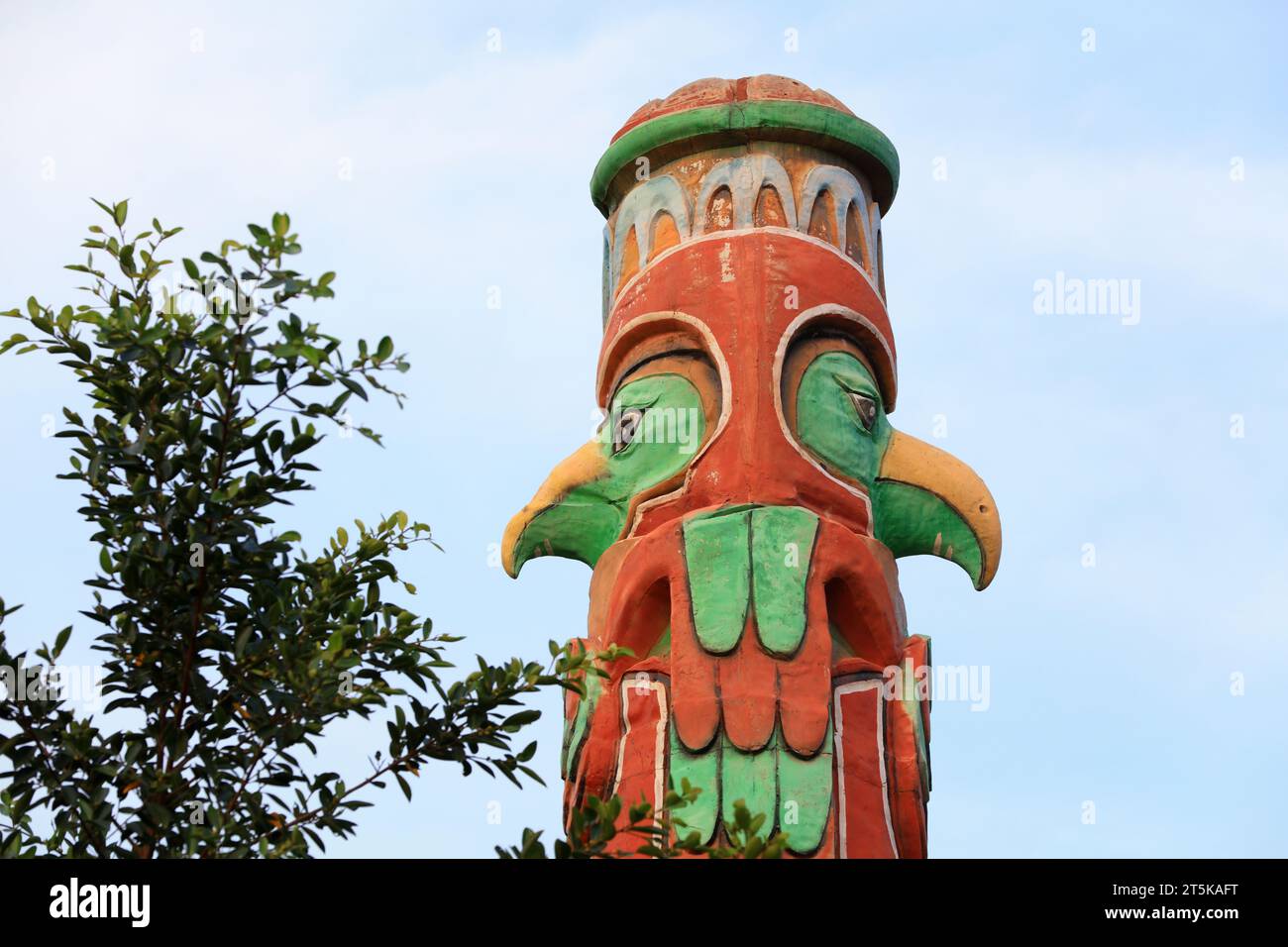 Wood totem poles in a park, China Stock Photo - Alamy