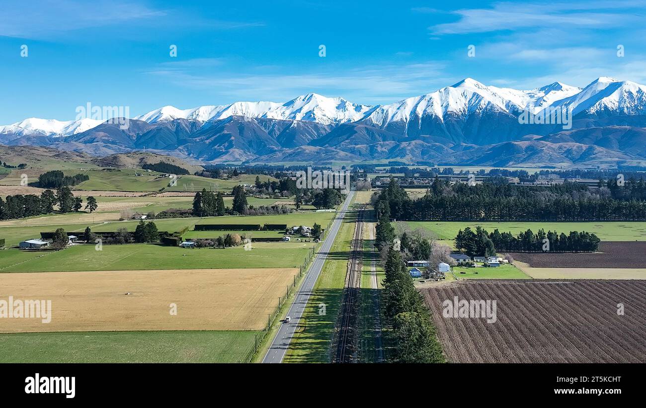 Aerial farming grazing and crop fields in rural countryside with a ...