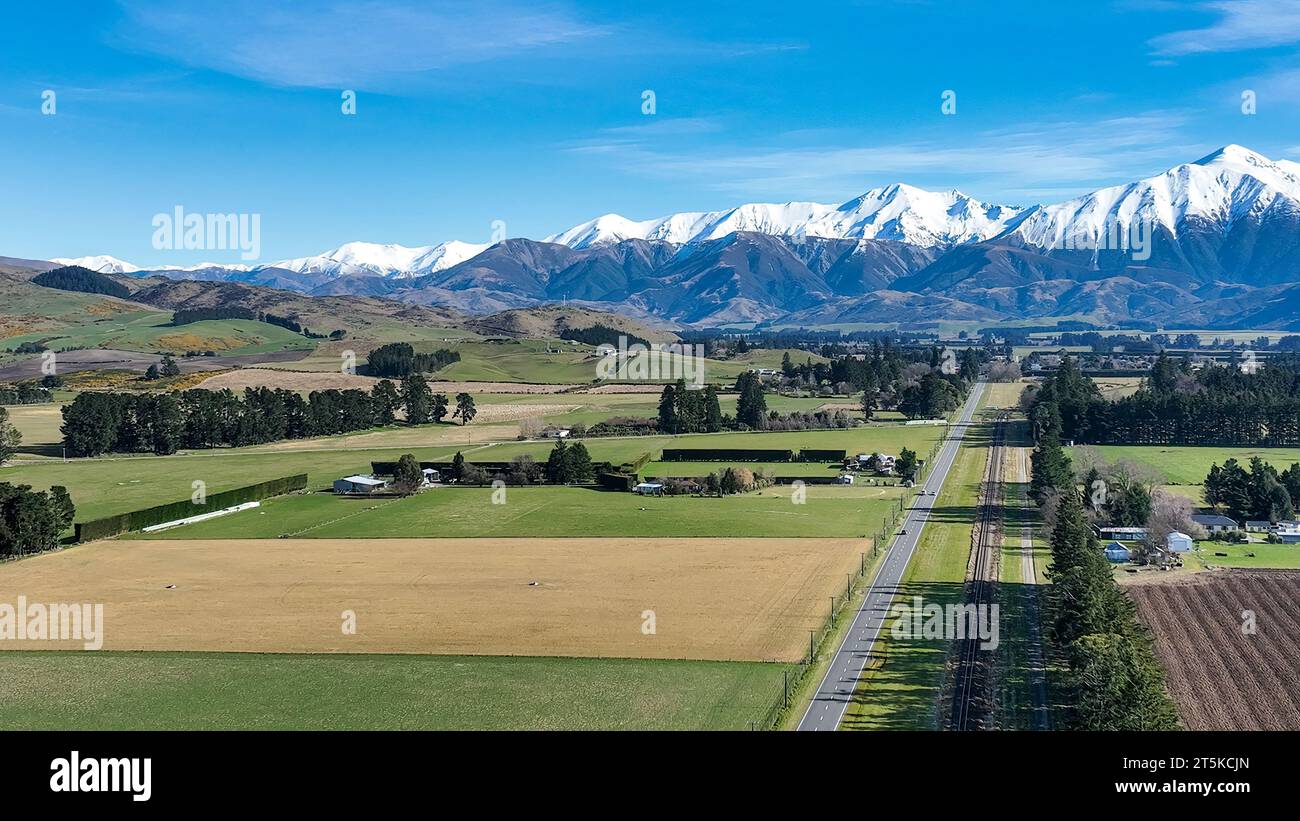 Aerial farming grazing and crop fields in rural countryside with a ...
