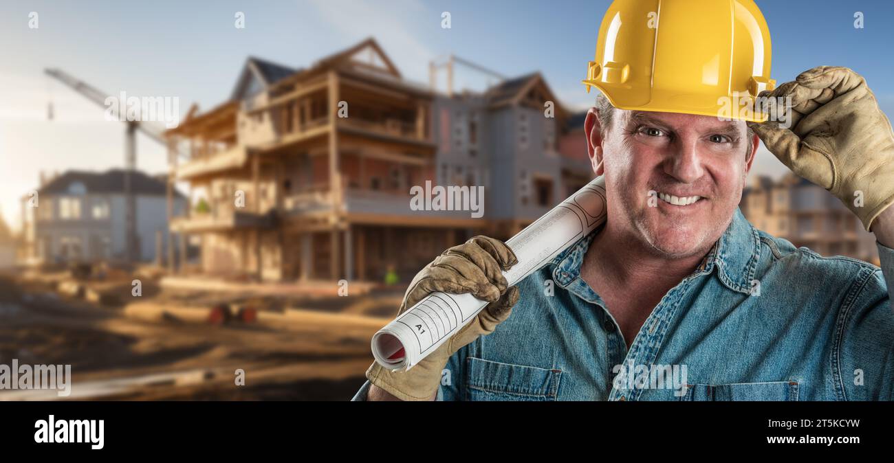 Friendly Male Contractor at a Construction Site Wearing a Hard Hat and ...