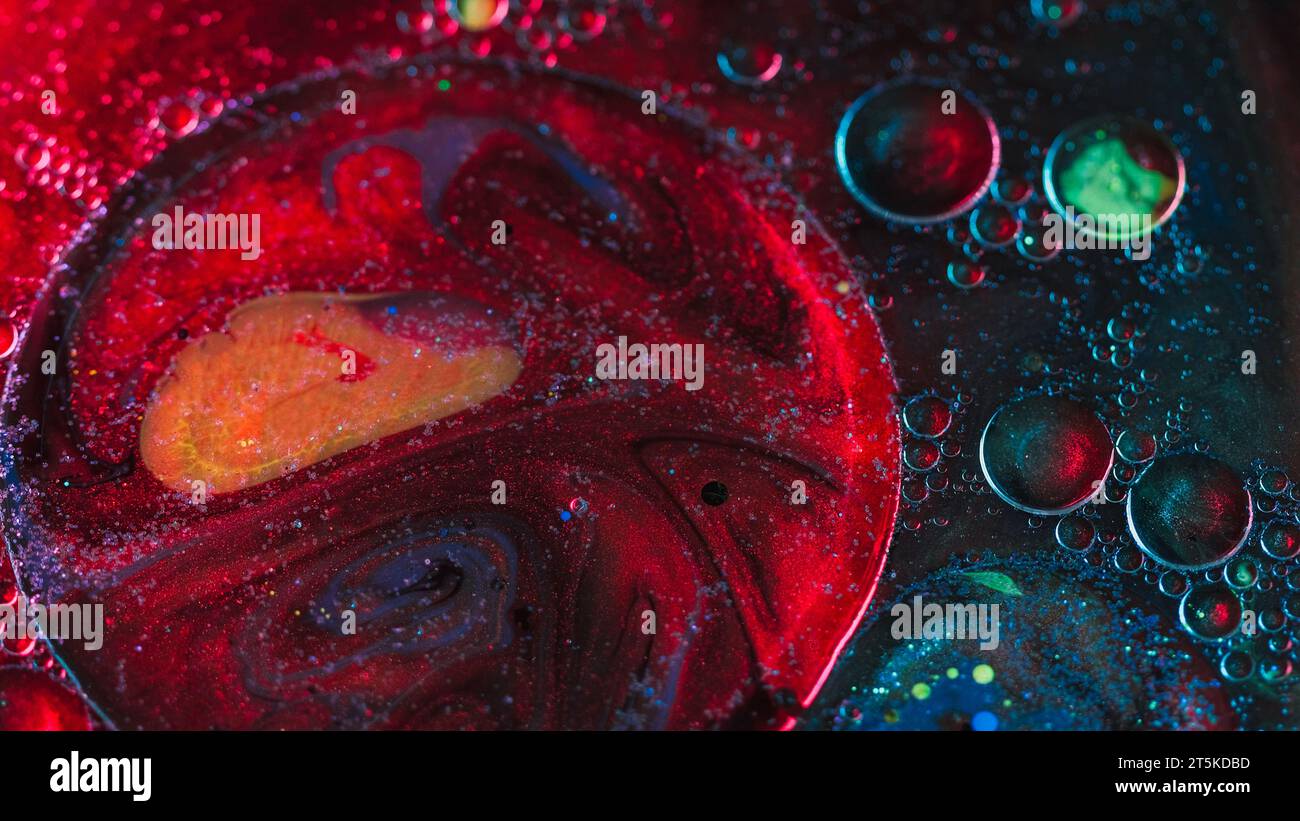 Ink mix background glitter dye purple red blot Stock Photo - Alamy