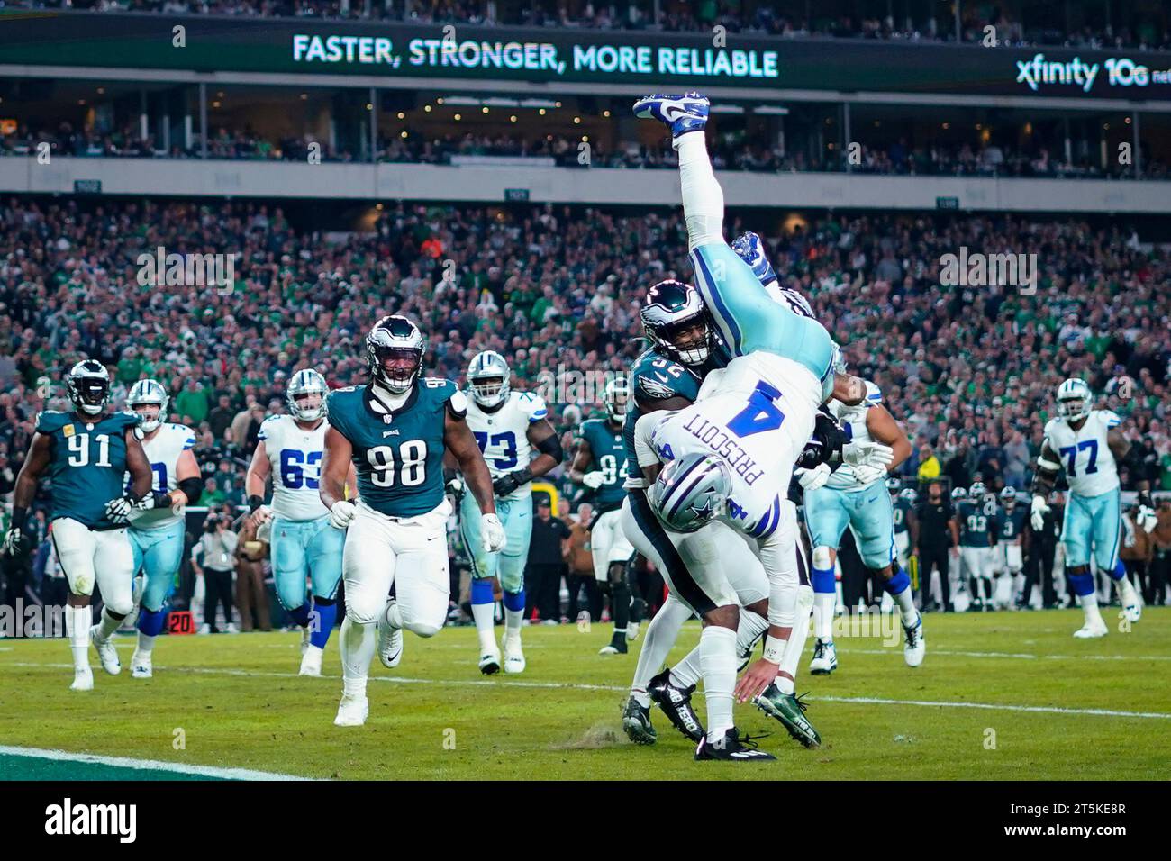 Dallas Cowboys quarterback Dak Prescott (4) is stoped by Philadelphia ...