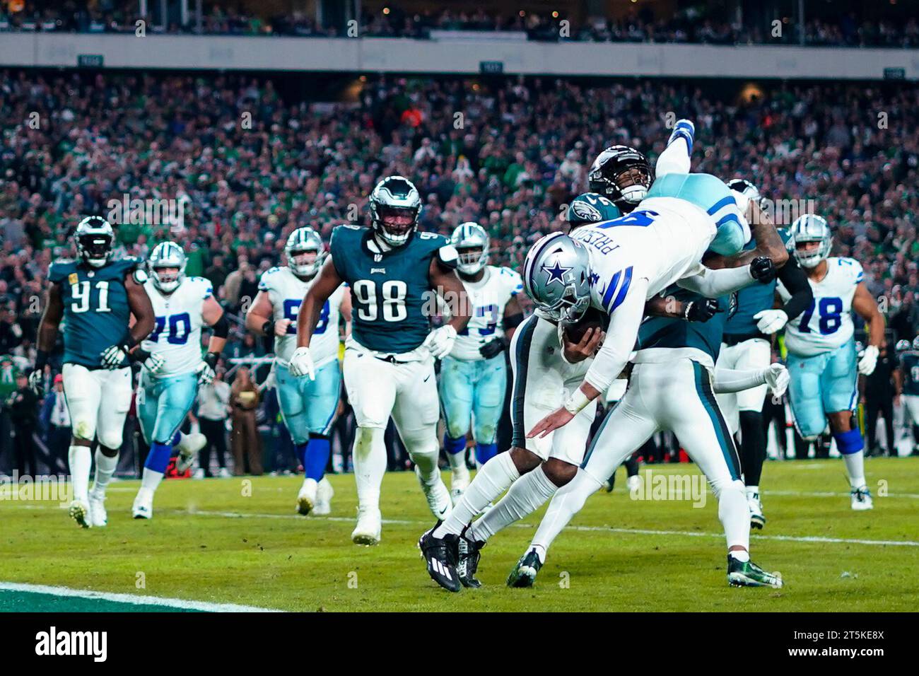 Dallas Cowboys quarterback Dak Prescott (4) is stoped by Philadelphia ...