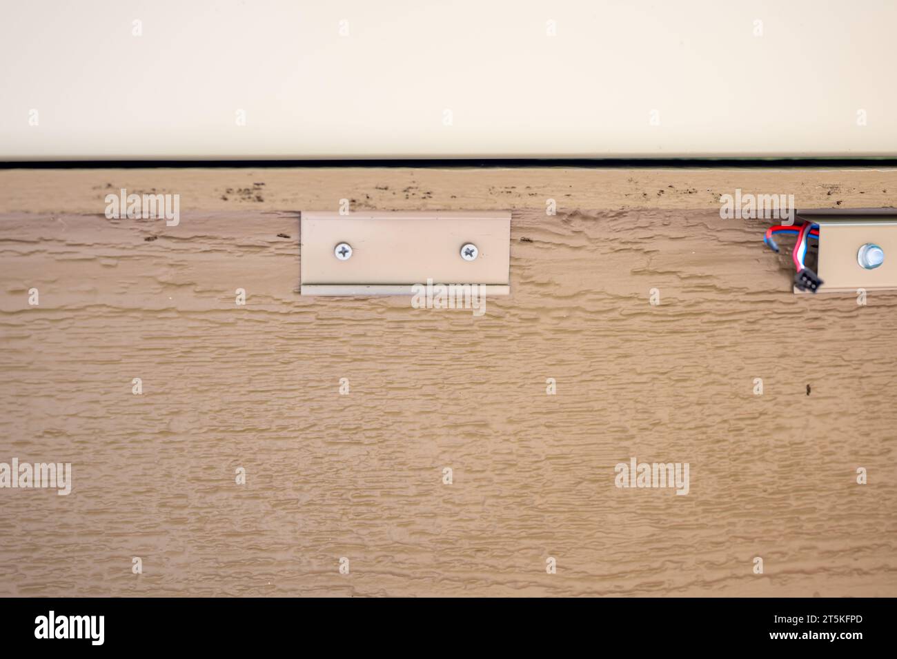 Clip bracket for holding metal channels for permanent holiday LED ...