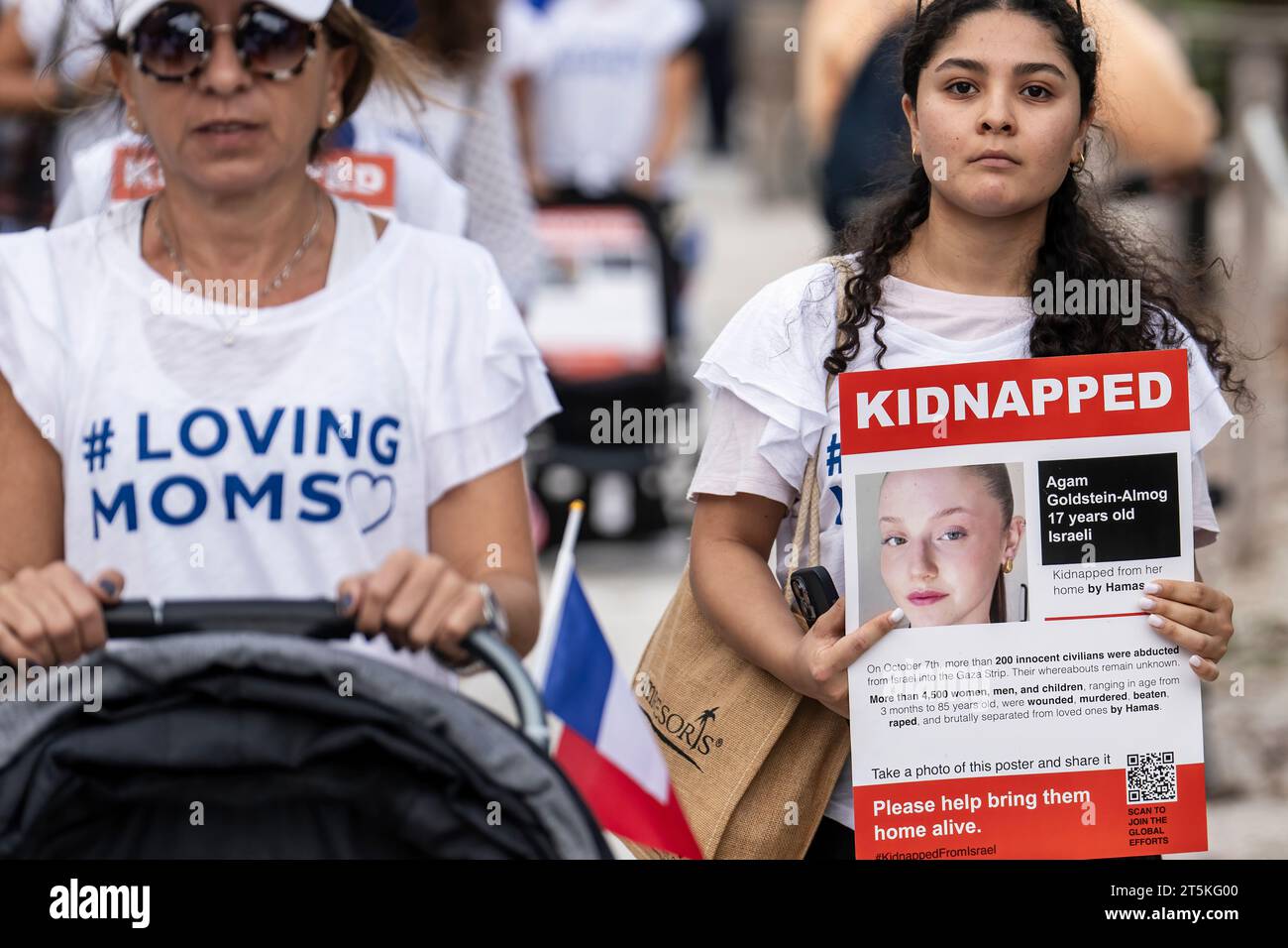 Surfside, Florida, USA. 5th Nov, 2023. A woman holds a poster of Agam ...