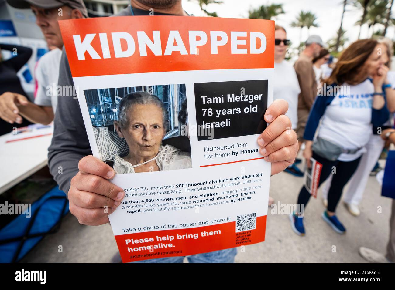 Surfside, Florida, USA. 5th Nov, 2023. A man holds a poster of 78 years ...