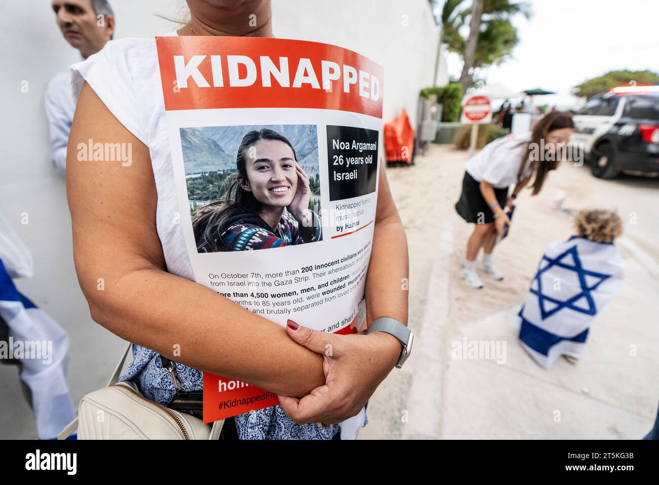 Surfside, Florida, USA. 5th Nov, 2023. A woman holds a poster of Noa ...