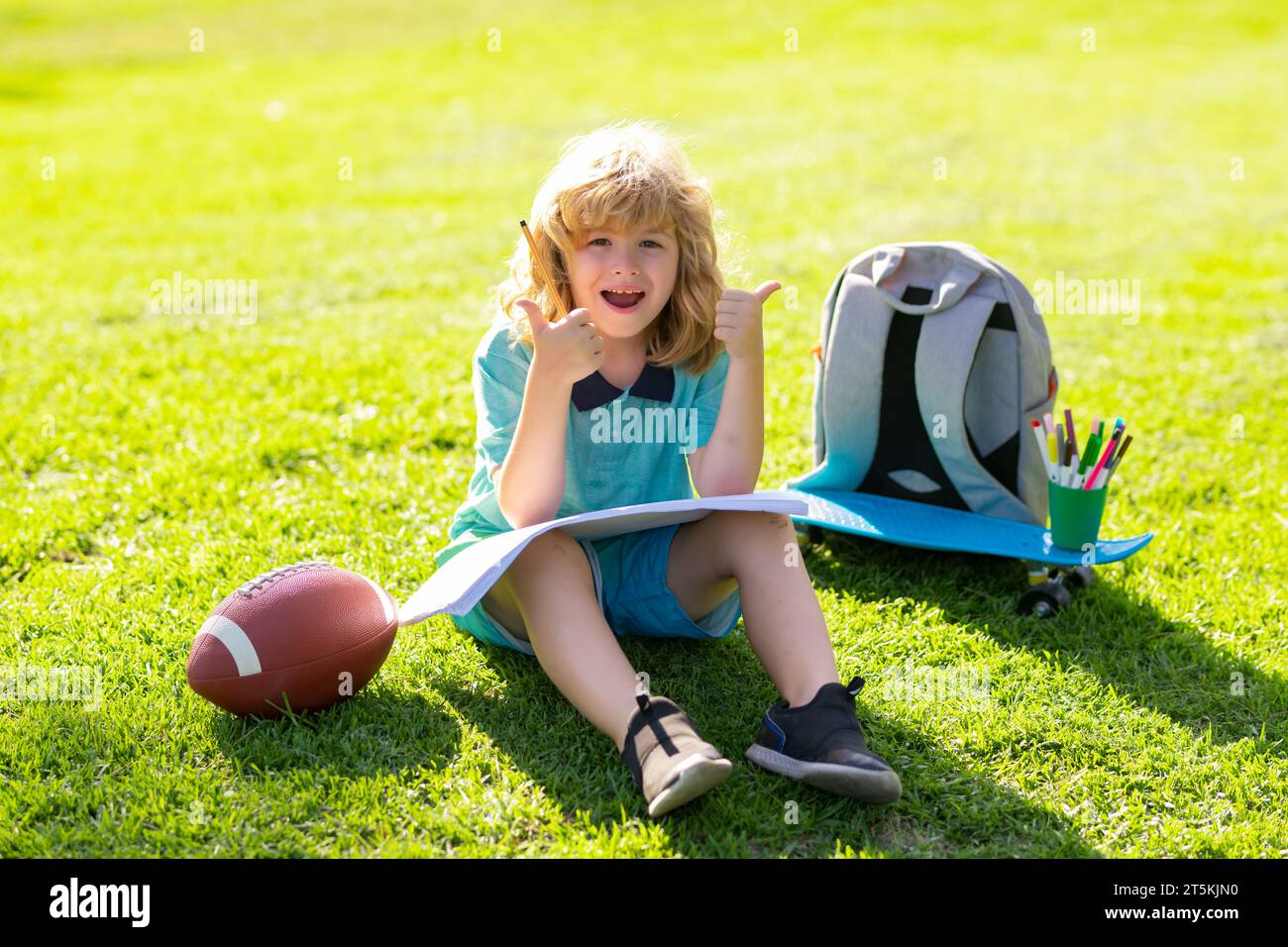 Outdoor kid play and draw craft artwork homework. School kid drawing in ...
