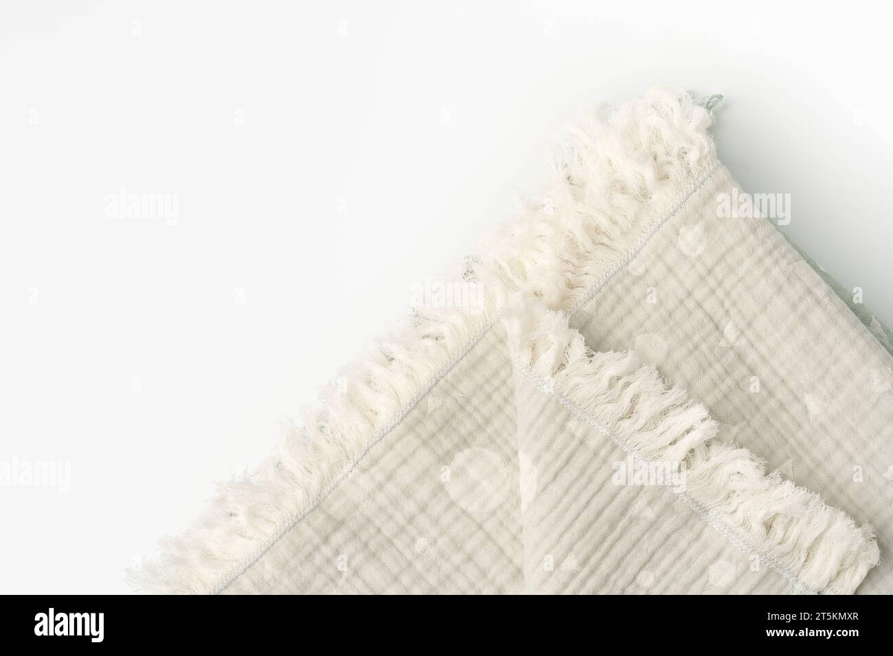 Gray muslin blanket for kids on white background Stock Photo - Alamy