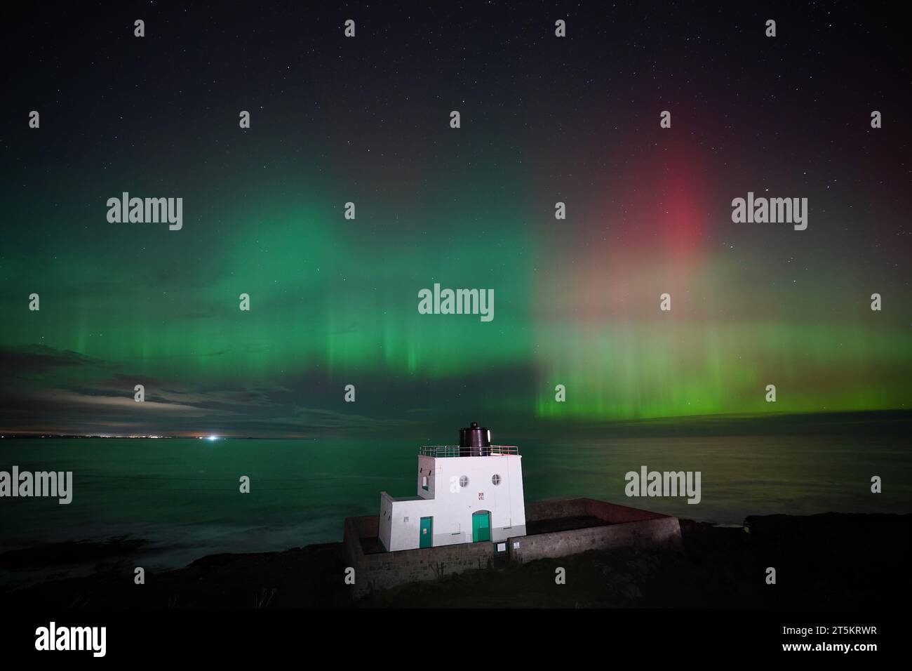 The aurora borealis, also known as the northern lights, appears over ...