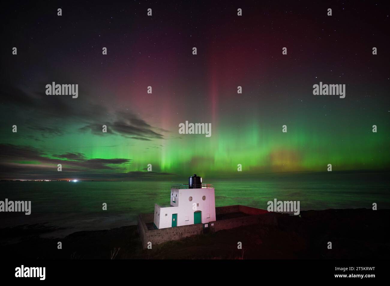 The aurora borealis, also known as the northern lights, appears over ...