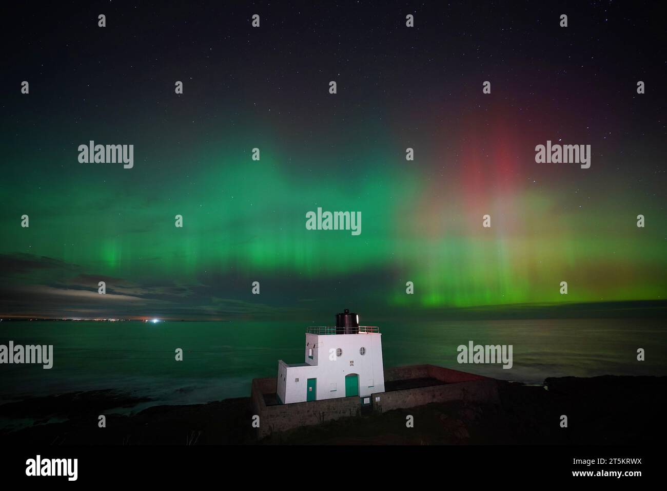 The aurora borealis, also known as the northern lights, appears over ...