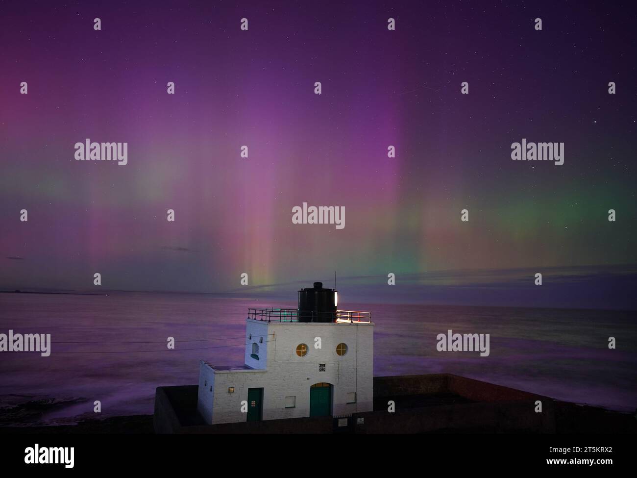 The aurora borealis, also known as the northern lights, appears over ...