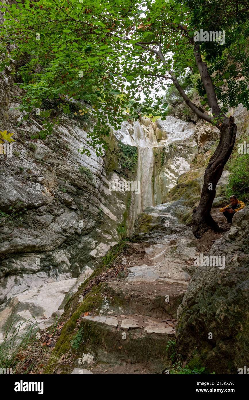 The Nydri Waterfall during the dry season with little water falling ...