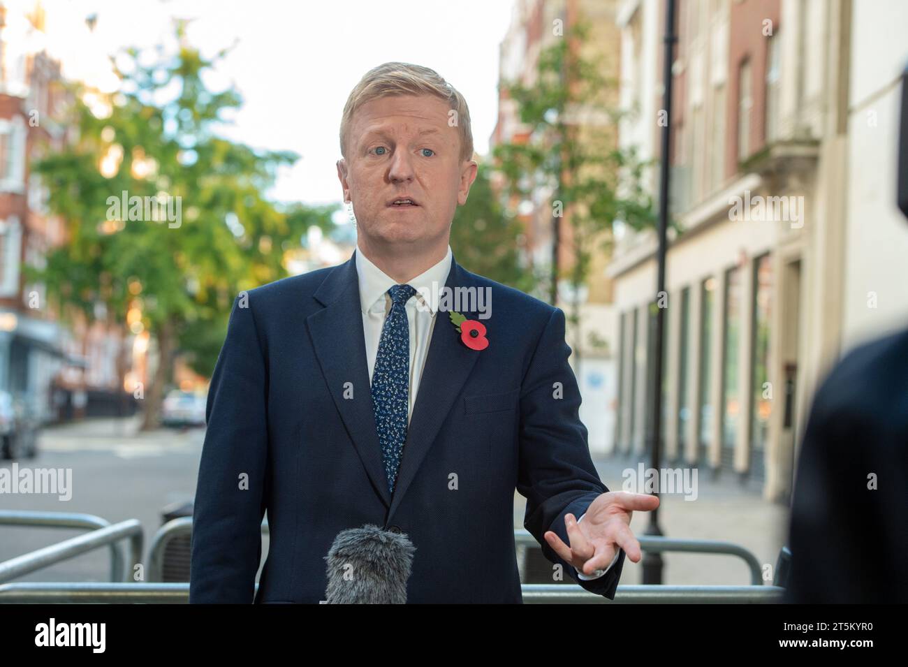 Deputy Prime Minister Oliver Dowden, seen being interviewed outside the ...