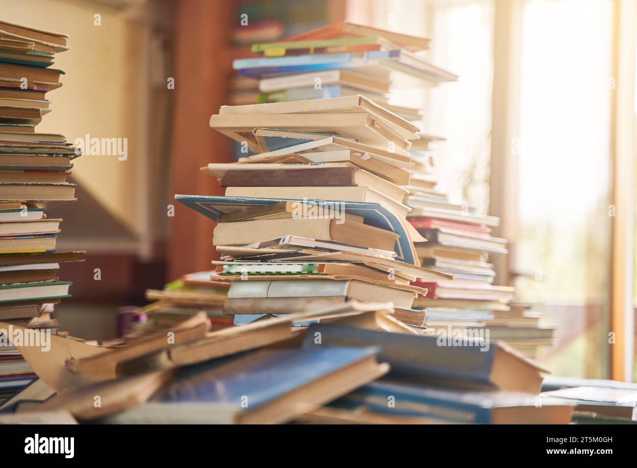 pile of old books on the table Stock Photo - Alamy