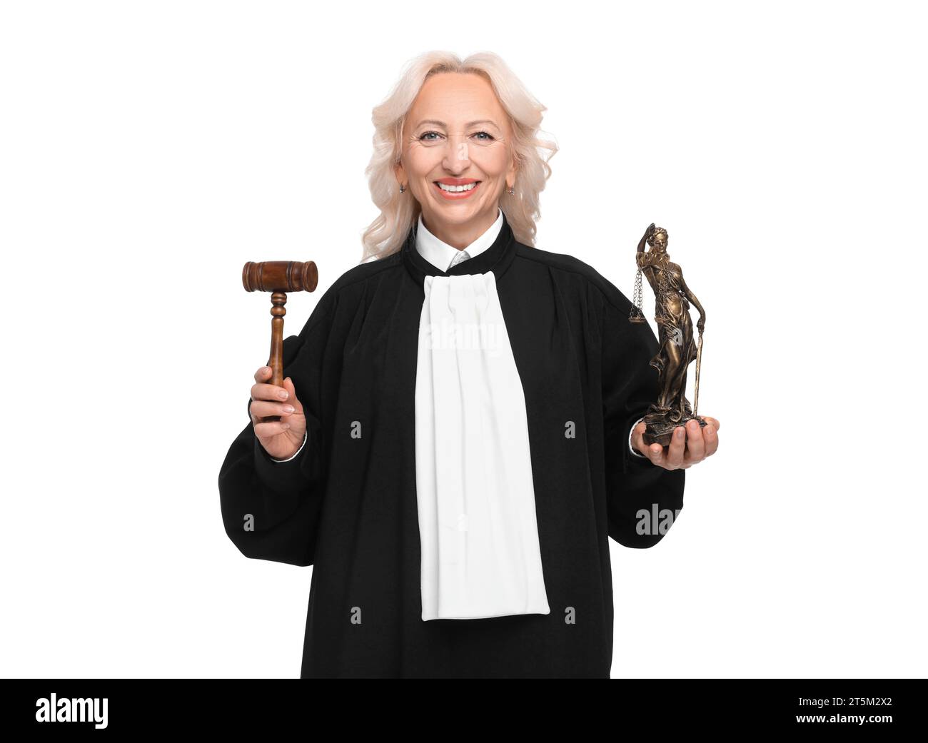 Smiling senior judge with gavel and figure of Lady Justice on white ...