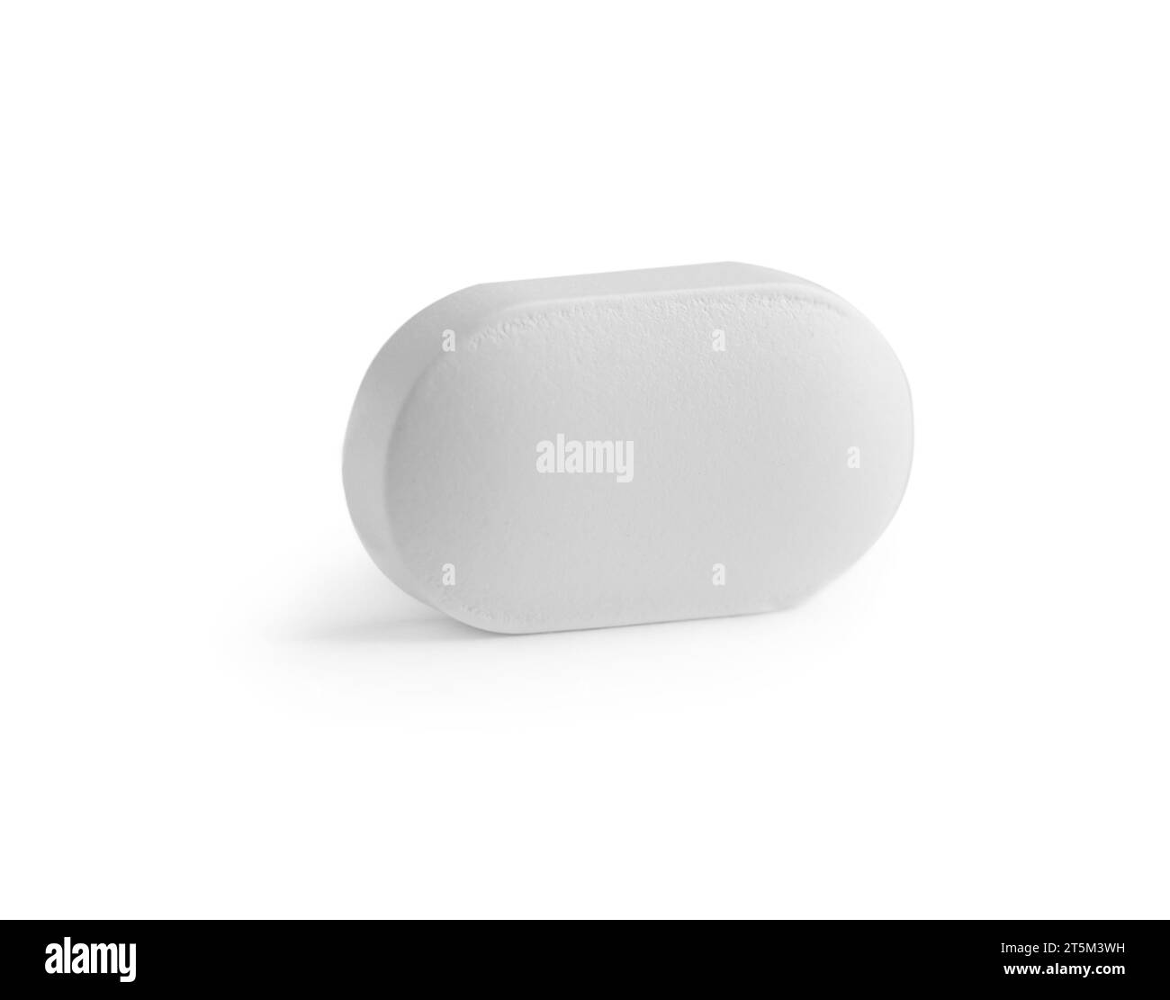 One pill on white background. Medicinal treatment Stock Photo - Alamy