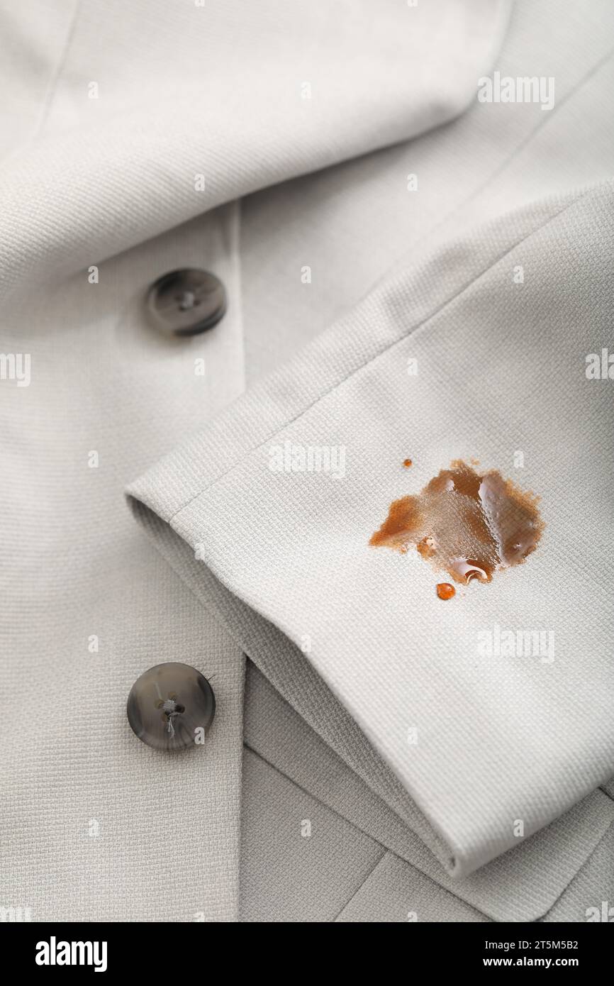 Dirty jacket with stain of coffee as background, closeup Stock Photo ...