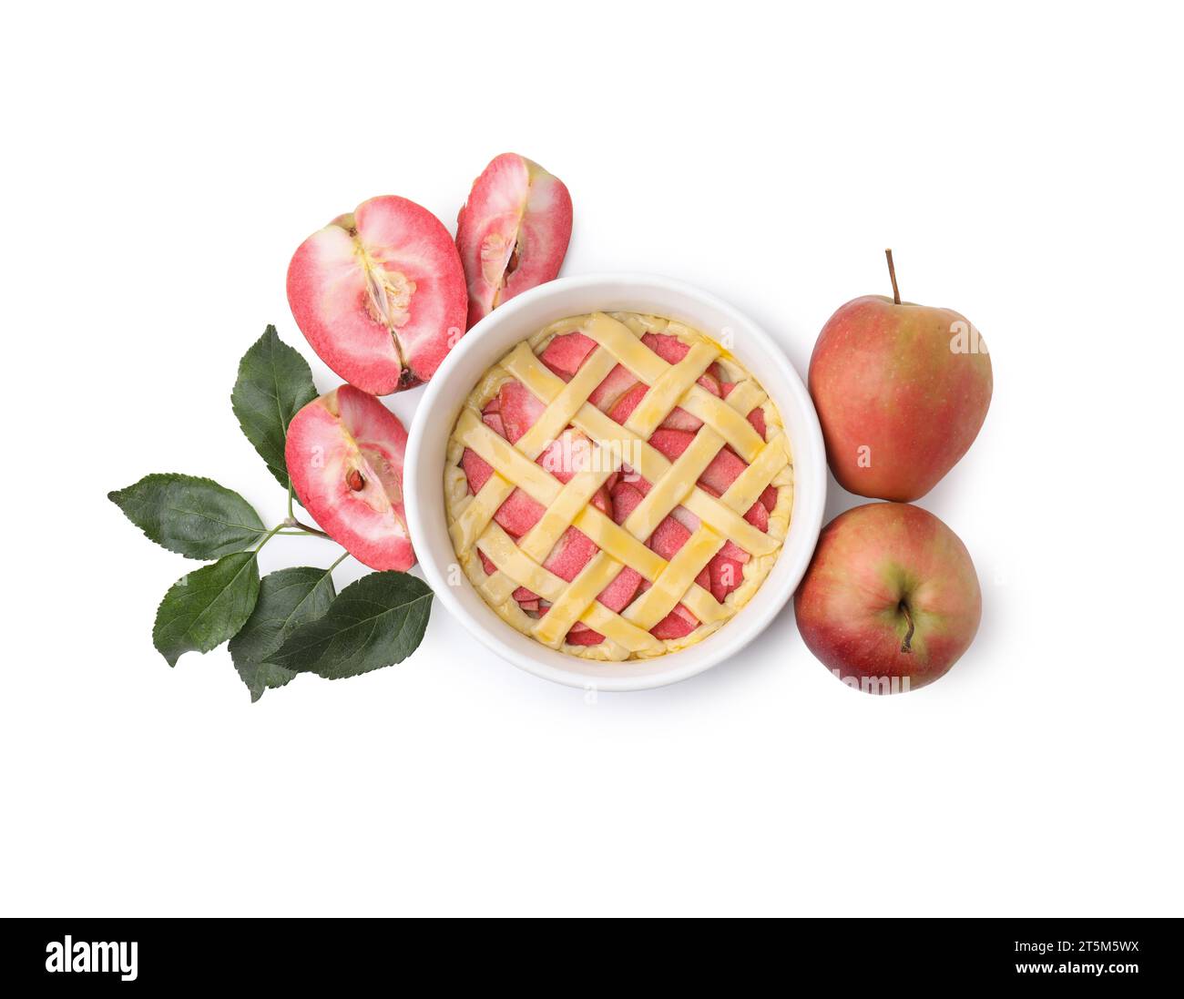 Raw apple pie, fruits and leaves isolated on white, top view Stock ...