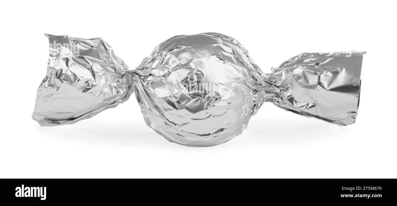 Tasty candy in silver wrapper isolated on white Stock Photo - Alamy
